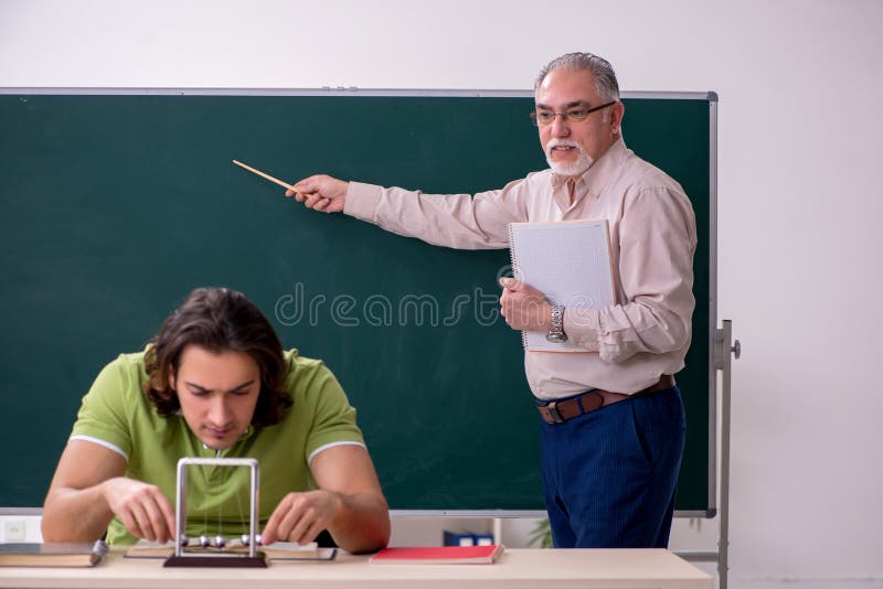 Old Professor Physicist and Young Student in the Classroom Stock Photo ...