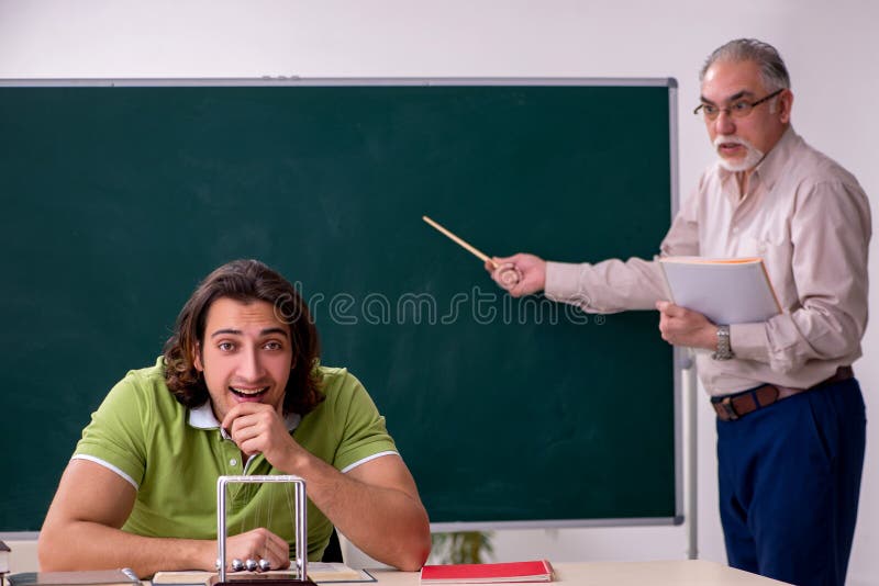 Old Professor Physicist and Young Student in the Classroom Stock Photo ...