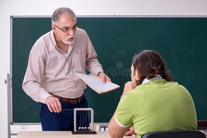 Old Professor Physicist and Young Student in the Classroom Stock Photo ...