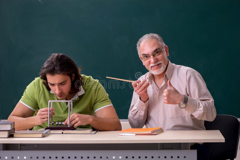 Old Professor Physicist and Young Student in the Classroom Stock Photo ...