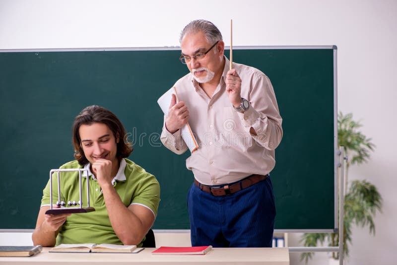 Old Professor Physicist and Young Student in the Classroom Stock Photo ...