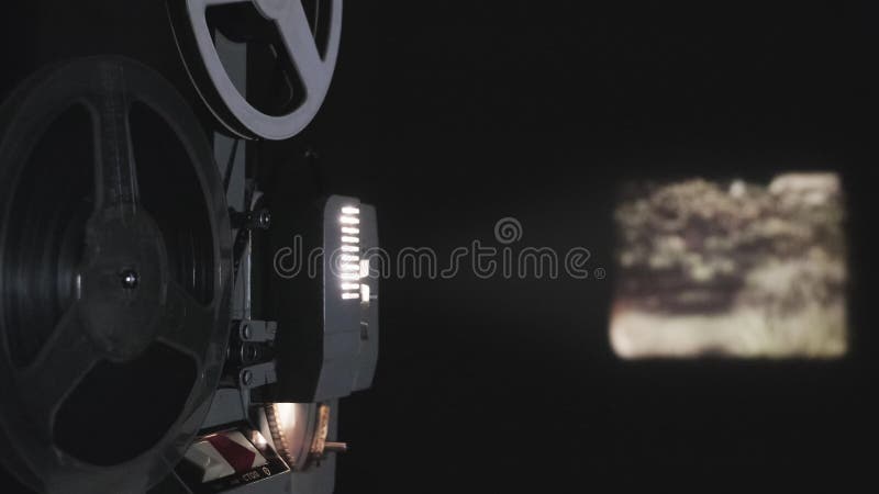 Old projector showing film stock video. Video of history - 347165807
