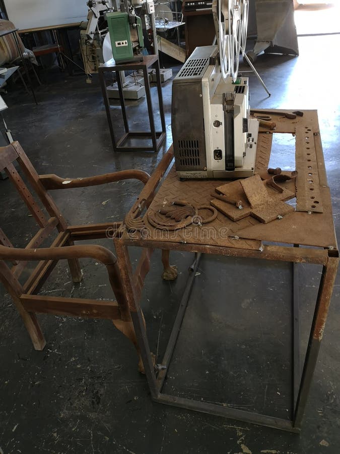 Old projector and table stock image. Image of projector - 136827107