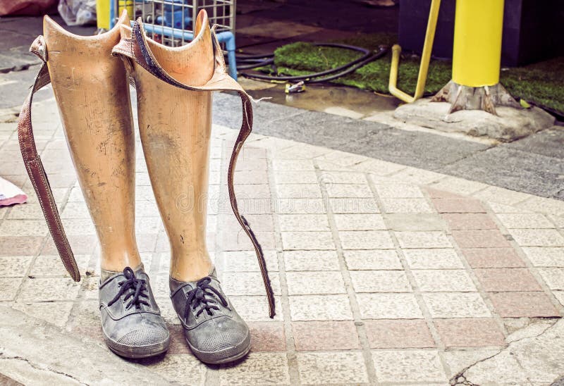 Old Prosthetic Legs Set on a Cement Floor Stock Image - Image of care ...