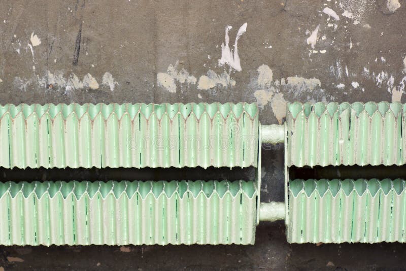 Old radiator on the wall. stock photo. Image of paint - 109735458