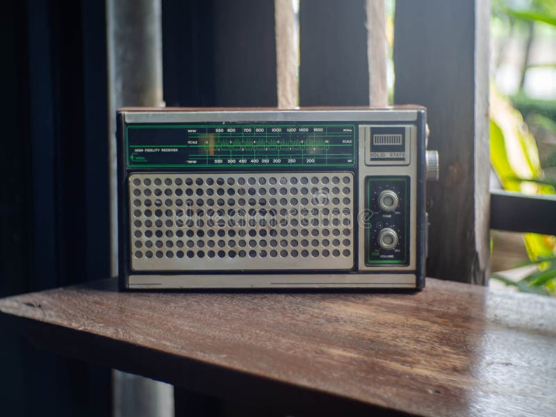 An Old Radio on a Wooden Table Stock Photo - Image of music, color ...