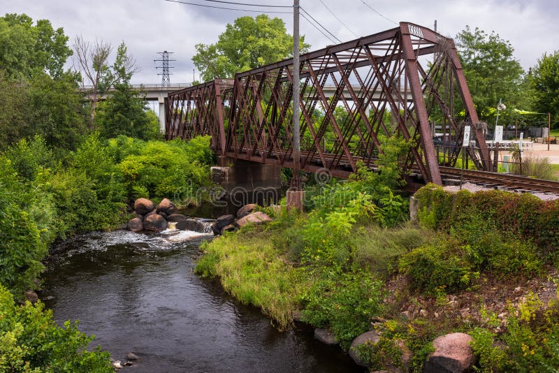 Old Railroad Bridge Crossing a River in Town Stock Image - Image of ...