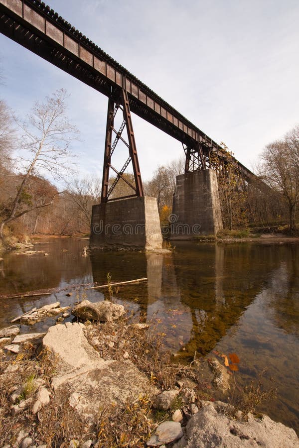 Old Railroad Bridge Over a Creek Vertical Stock Photo - Image of ...