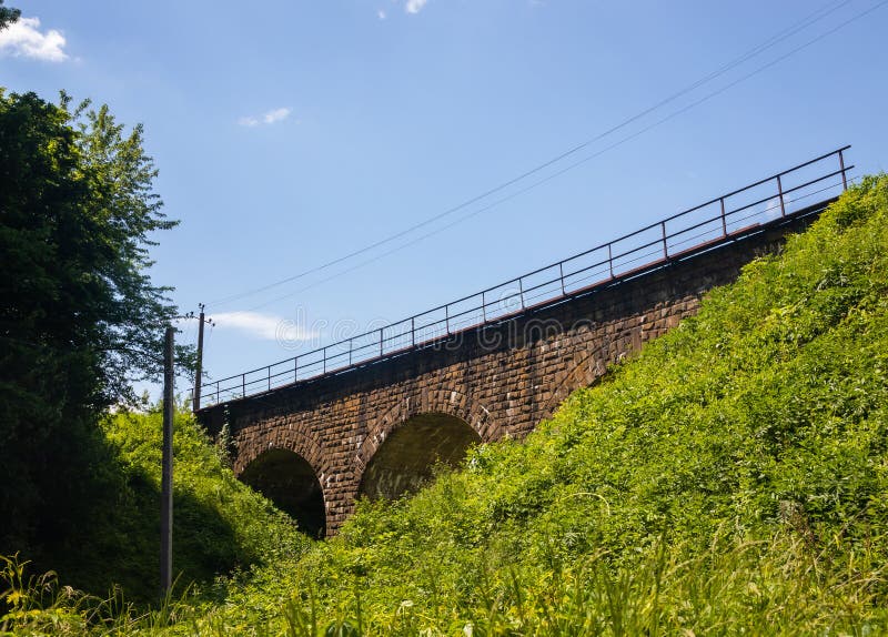 The Old Railway Bridge is Built of Stone. Historic Building Stock Image ...