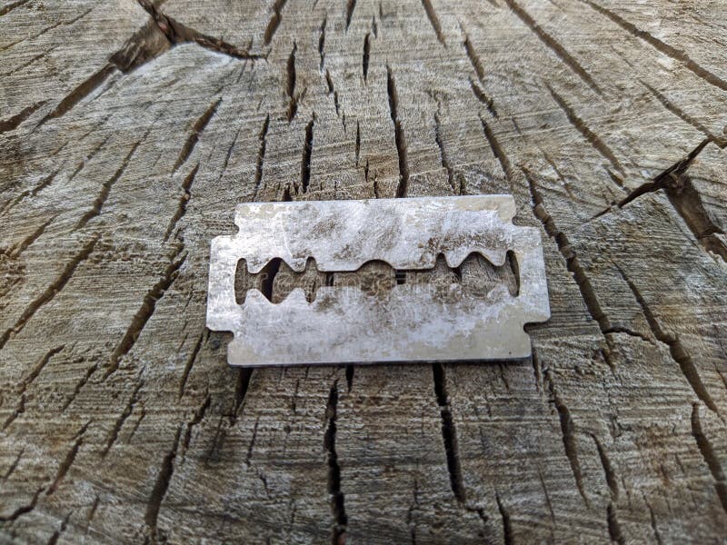 Old Razor Blade on Gray Wooden Background Stock Image - Image of edge ...