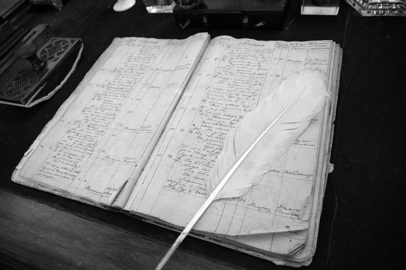 Old Recipe Book and Feather Pen for Writing Lies on the Table Stock ...