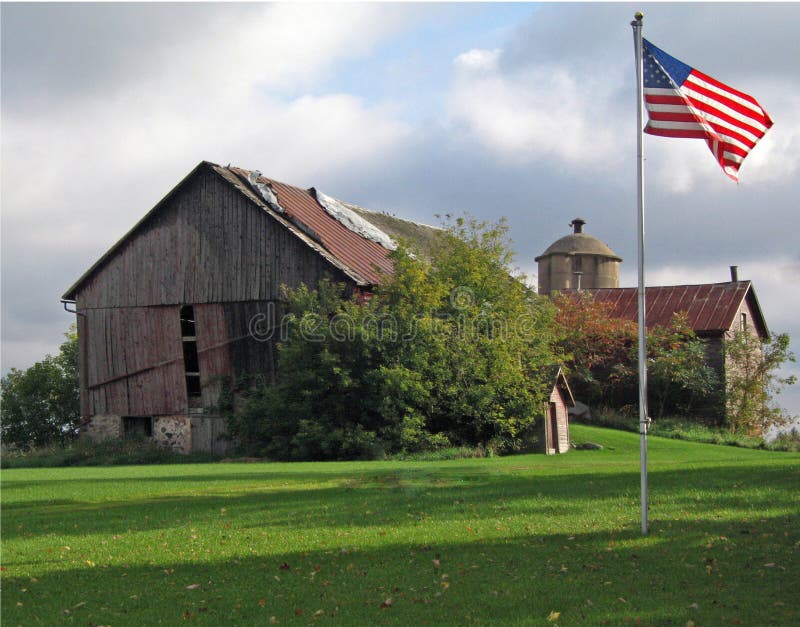 Old Red Barn with Flag stock image. Image of clouds, shadows - 4452943