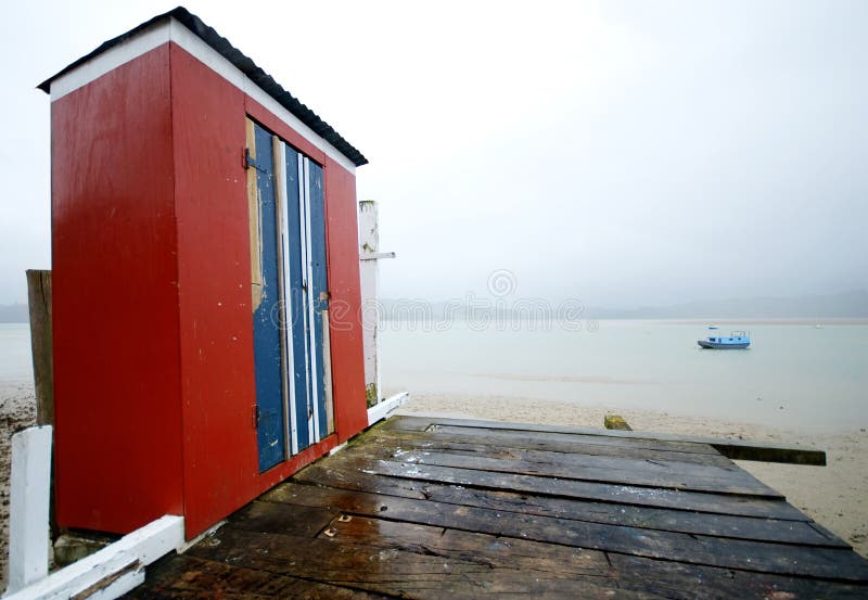 Old red boat shed stock photo. Image of pohutukawa, beach - 3866284
