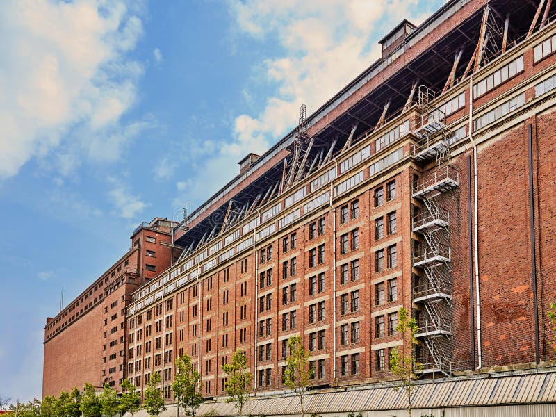Old Red Brick Building Against Blue Sky Stock Photo - Image of ...