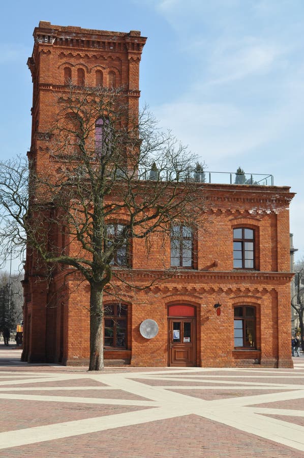 Old Red Brick Building with a Tenement Tower in the Old Town Stock ...