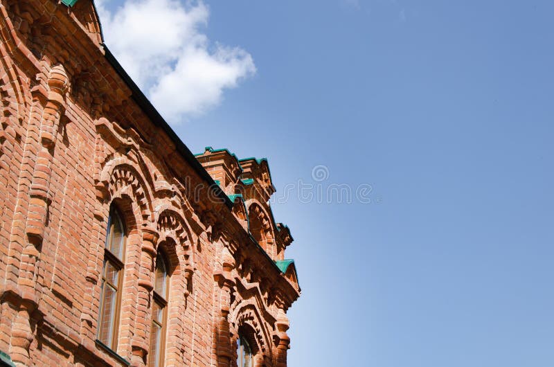 Old Red Brick House Against Blue Sky with Clouds. Ancient Architectural ...
