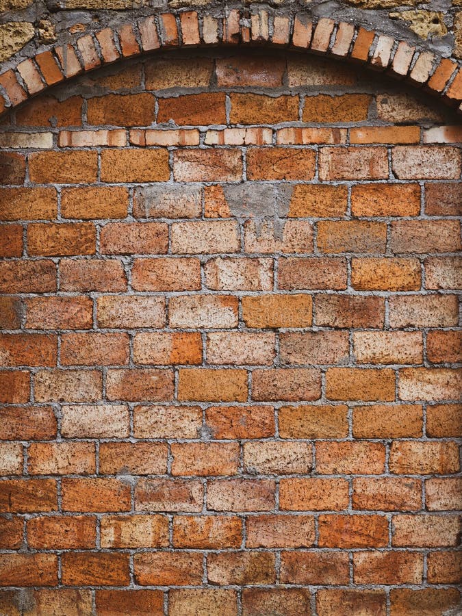 Red brick wall with arch stock photo. Image of mortar - 2335868