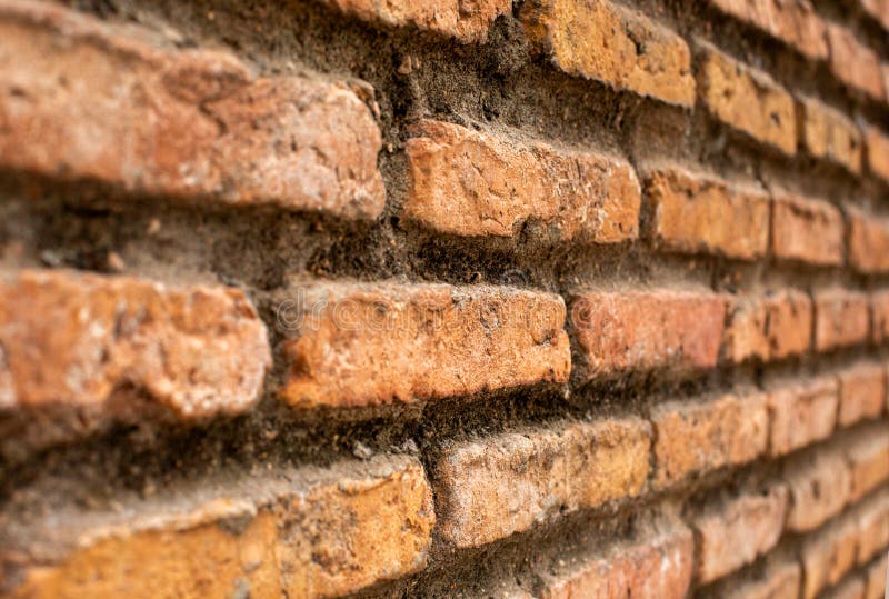 An Old Brick Wall Stretching into the Distance. Stock Image - Image of ...
