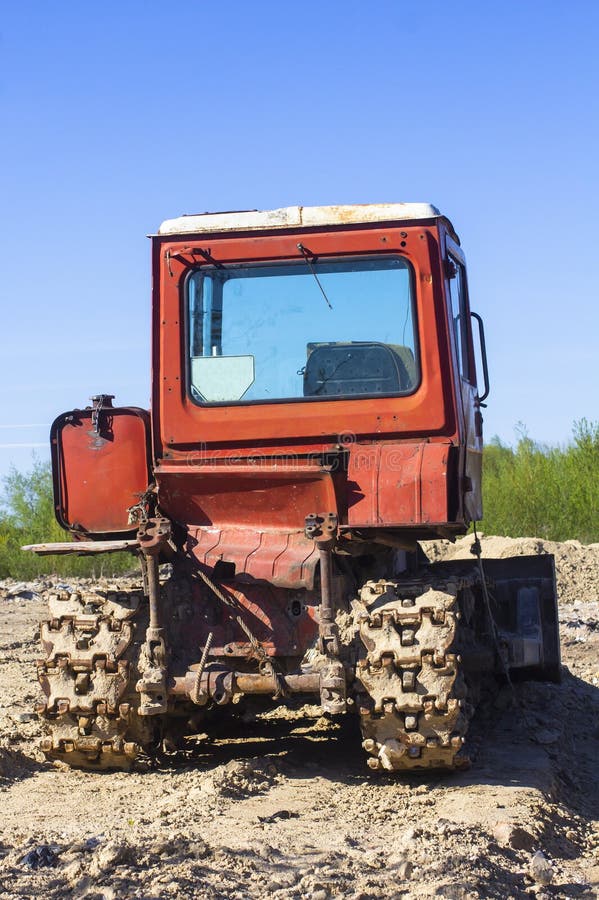 Old Red Bulldozer Against the Blue Sky. Back View Stock Photo - Image ...