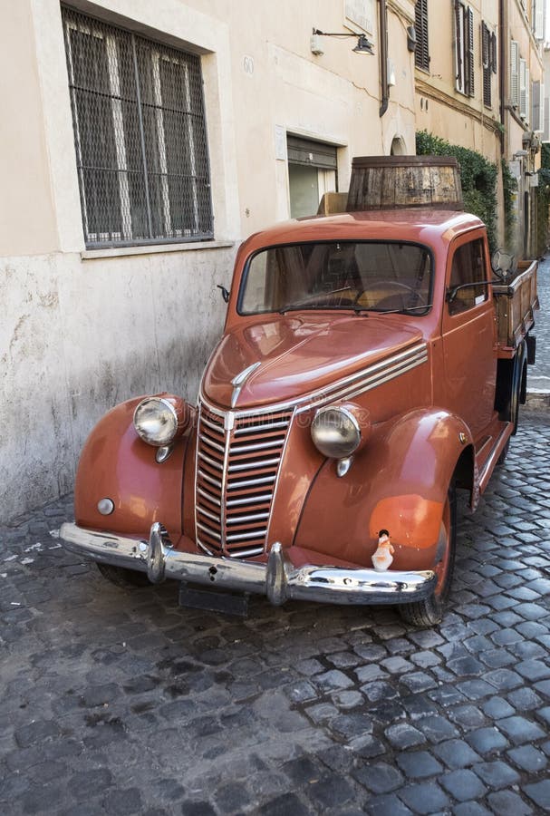 Old Red Car Parked in the Middle of the Street Editorial Photography ...
