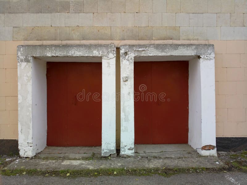 Old Red Doors on the Facade of the Building Stock Photo - Image of ...