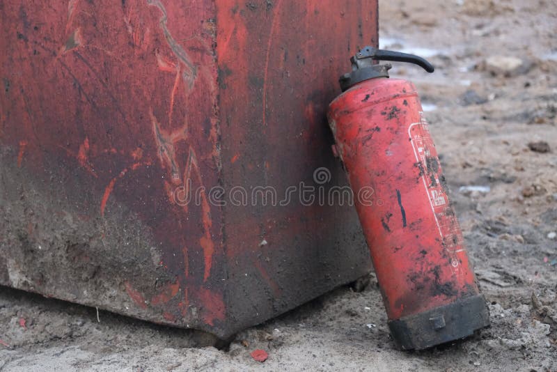 Old Red Fire Extinguisher in a Junkyard Stock Image - Image of filthy ...