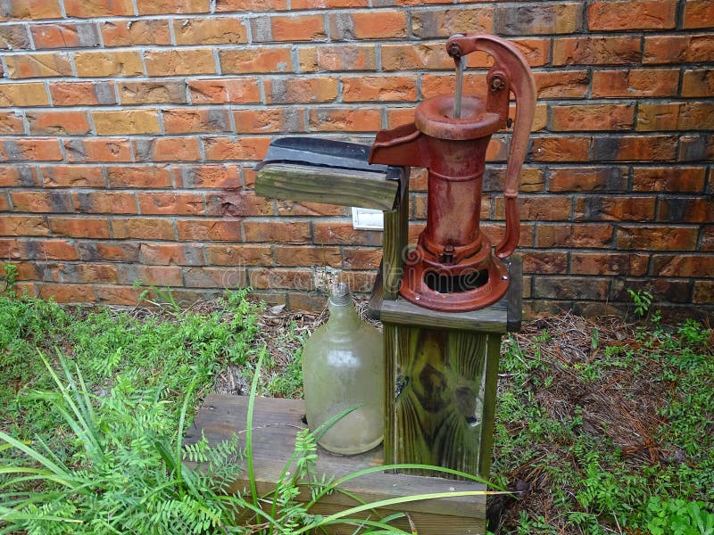 Old Red Hand Operated Water Pump Stock Photo - Image of simple ...