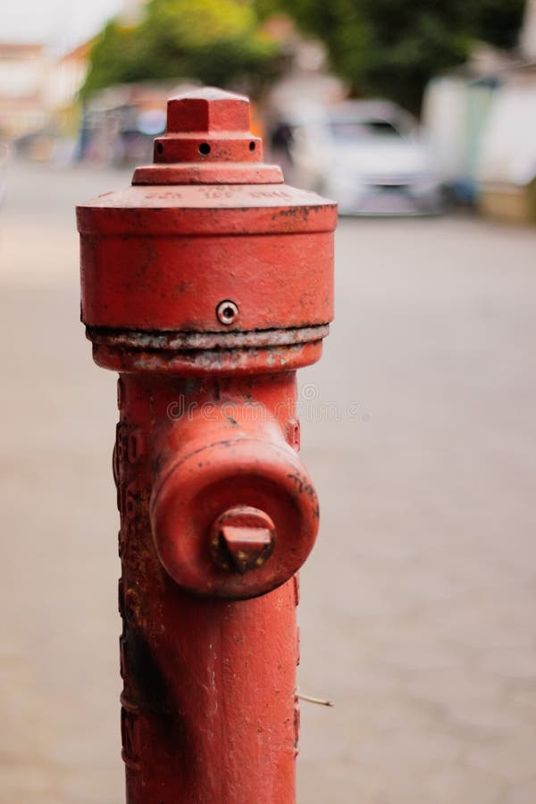 An Old Red Hydrant on the Street Stock Image - Image of central, java ...