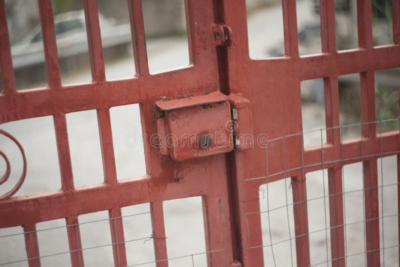 Old red iron gate stock photo. Image of bars, fear, gate - 161189016