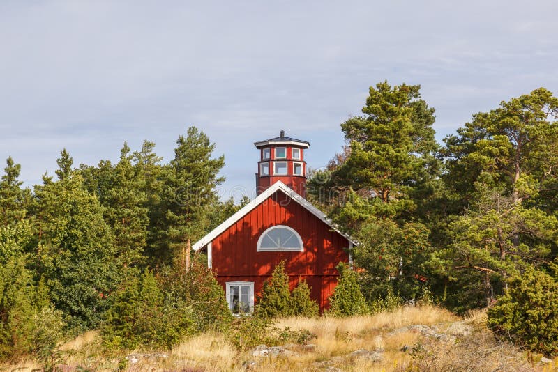 Old Red Lighthouses in the Forest on an Island Editorial Photo - Image ...