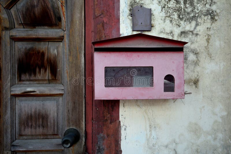 Old red mailbox on wall stock photo. Image of postbox - 78309534