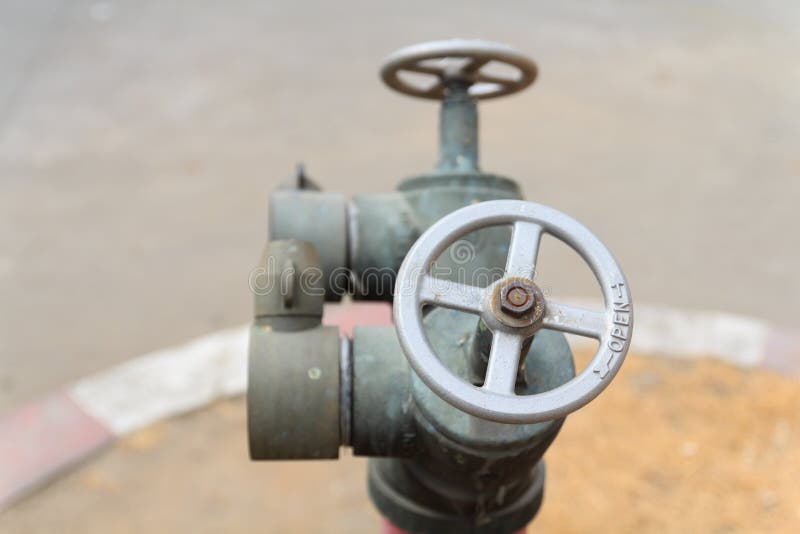 Old Red Metallic Fire Hydrant Plug Stock Photo - Image of decay, metal ...