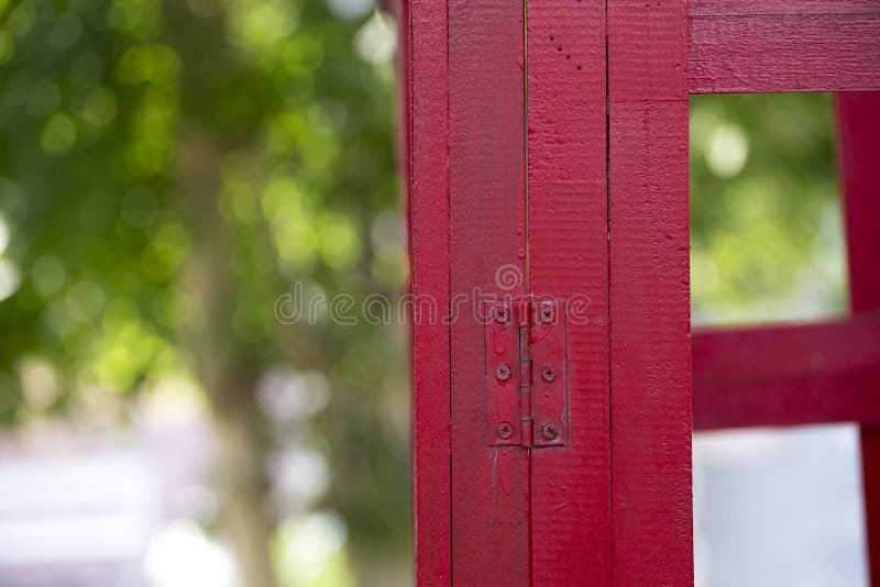 Old red paint door hinge. stock photo. Image of retro - 94634624