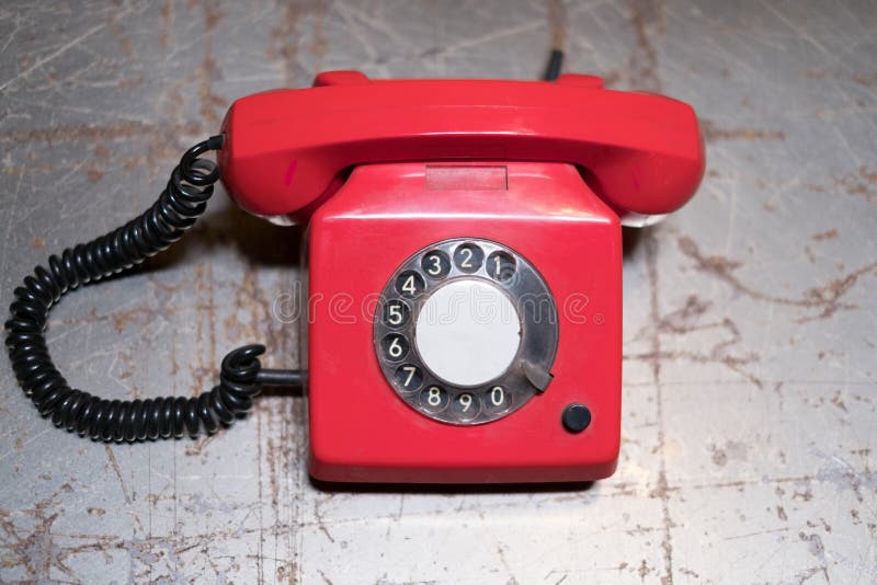 Old Red Phone on Table - Vintage Telephone on Desk Stock Photo - Image ...