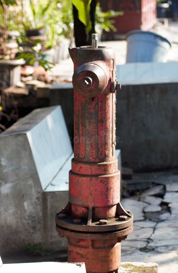 Old red rusty fire hydrant stock photo. Image of equipment - 186683554