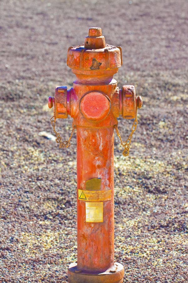 Old Rusty Hydrant in Front of Natural Stone Wall in an Oblique Camera ...