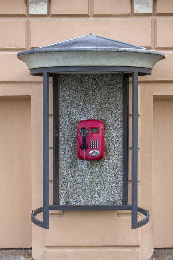Old Red Shabby Street Telephone Under a Canopy Stock Photo - Image of ...