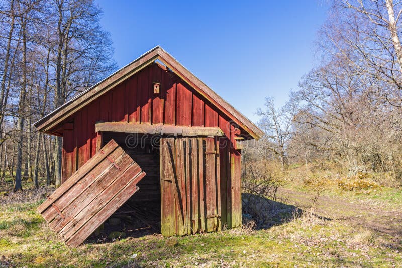 Old Red Shed with Hanging Doors Stock Image - Image of deciduous ...