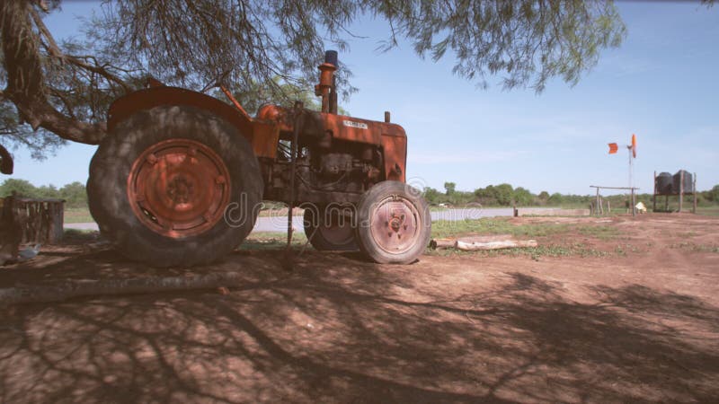 Old red tractor farm stock footage. Video of field, nature - 199522222