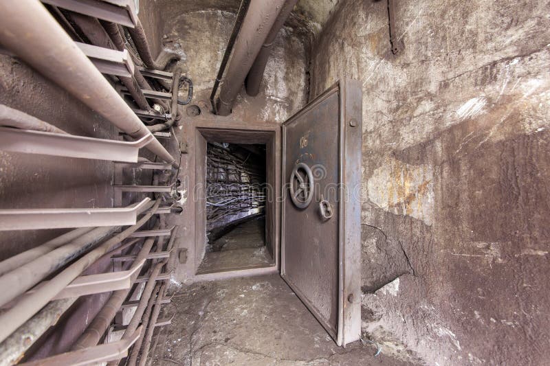 Old Reinforced Security Door in an Underground Communication Tunnel ...