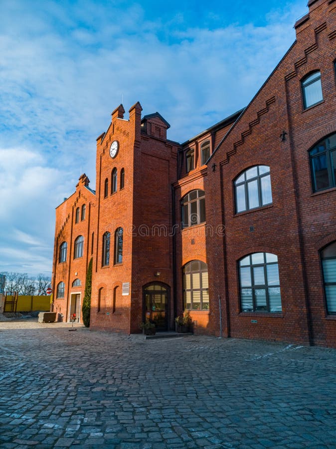 Old Renovated Red Brick Building with Clock on Top Editorial Photo ...