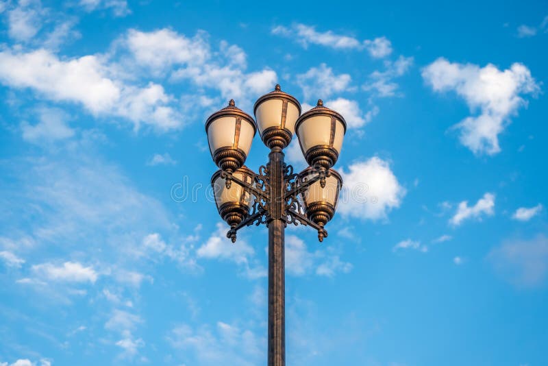 The Old Retro Lamp Post and the Beautiful White and Blue Sky Stock ...