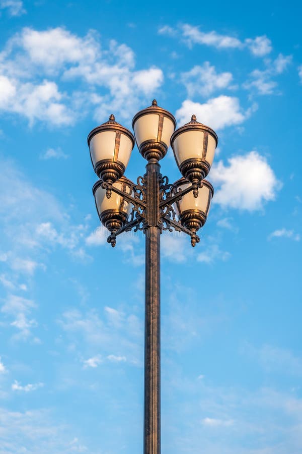 The Old Retro Lamp Post and the Beautiful White and Blue Sky Stock ...