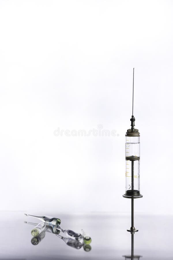 Old Metal Medical Syringe and Accessories on the Table Stock Image ...