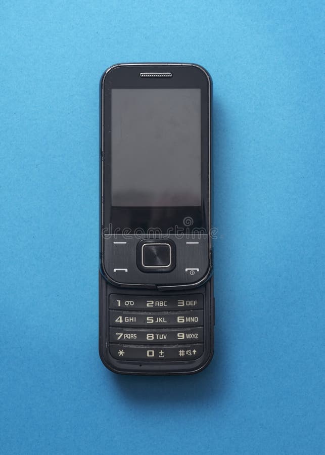 Old Retro Mobile Phone on Blue Background Stock Image - Image of call ...