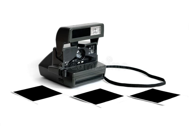 An Old Retro Polaroid Camera for Instant Photographing on a White ...