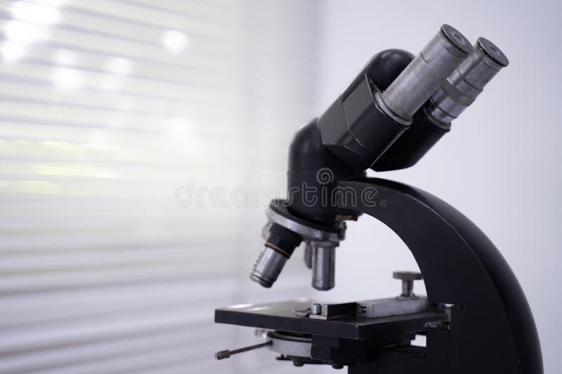 Old Retro Scientific Microscope Bokeh Light Background Stock Photo ...