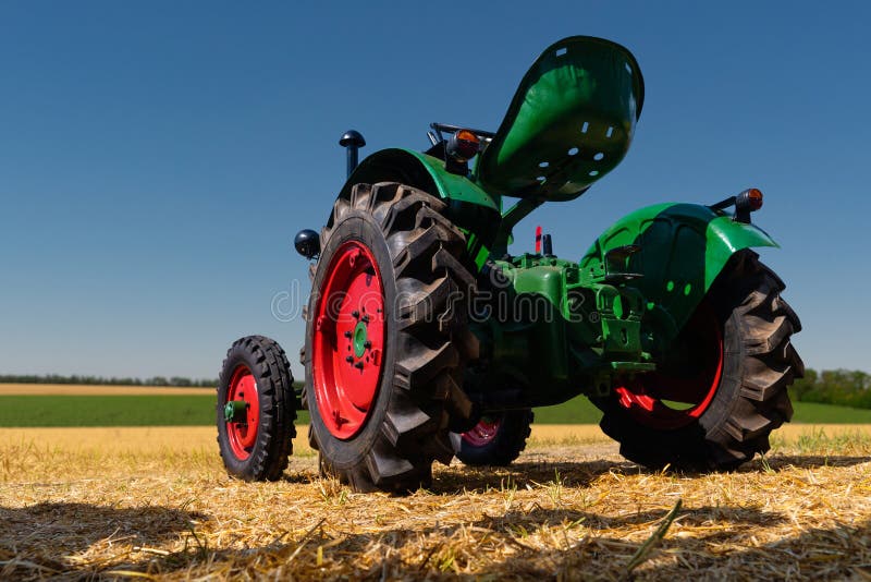 Old retro tractor stock photo. Image of small, farmer - 197379648