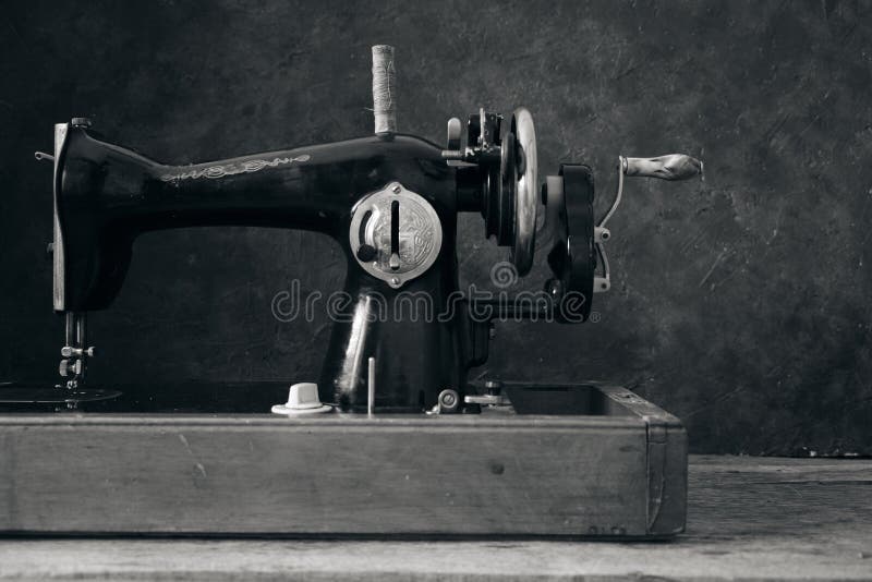 Old, Retro, Vintage Sewing Machine on a Dark Background of an Abstract ...