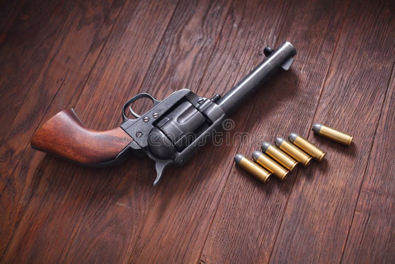 Old Revolver with Cartridges Stock Image - Image of nitro, revolver ...